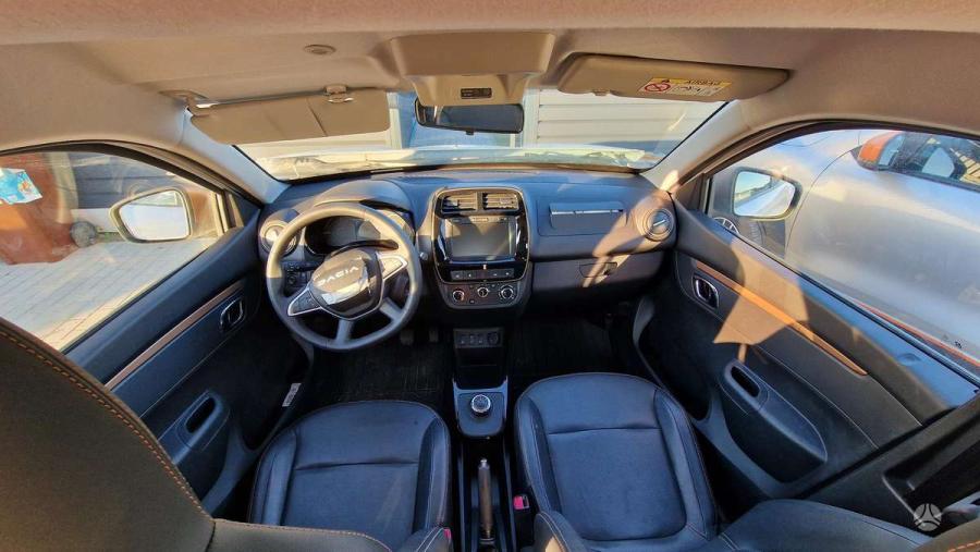 White Dacia Spring 2023 in Kaunas, with an engine capacity of 0.00 L and mileage of 25 thousand km for 5600 €, photo 9 on AUTOMOTO.COM.LV