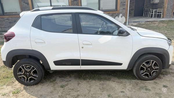 White Dacia Spring 2023 in Kaunas, with an engine capacity of 0.00 L and mileage of 15 thousand km for 5800 €, photo 1 on AUTOMOTO.COM.LV