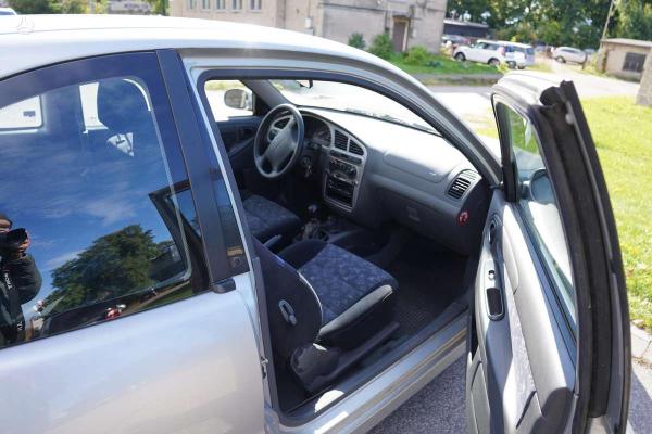 Grey Daewoo Lanos 2000 in Klaipeda, with an engine capacity of 1.35 L and mileage of 56 thousand km for 500 €, photo 7 on AUTOMOTO.COM.LV