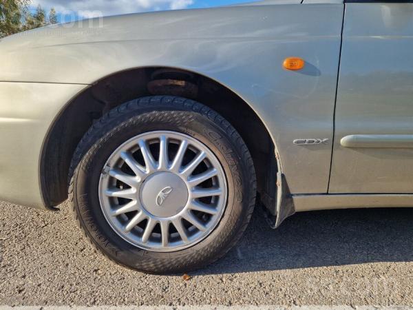 Grey Daewoo Leganza 1999 in Jekabpils, with an engine capacity of 2.00 L and mileage of 200 thousand km for 1900 €, photo 4 on AUTOMOTO.COM.LV