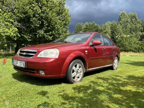 Sarkans Daewoo Nubira 2006 Viļņa, ar dzinēja tilpumu 1.80 L un nobraukumu 182 tūkst. km par 650 €, foto 2 vietnē AUTOMOTO.COM.LV