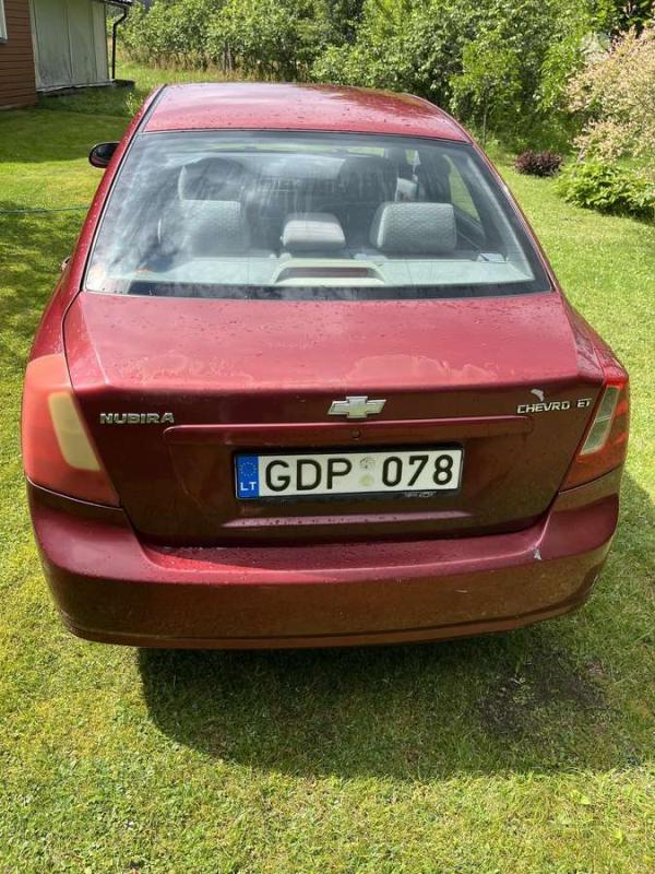 Sarkans Daewoo Nubira 2006 Viļņa, ar dzinēja tilpumu 1.80 L un nobraukumu 182 tūkst. km par 650 €, foto 5 vietnē AUTOMOTO.COM.LV