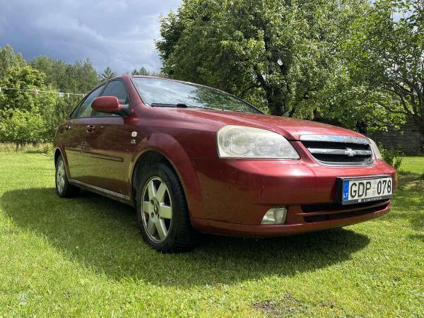 Sarkans Daewoo Nubira 2006 Viļņa, ar dzinēja tilpumu 1.80 L un nobraukumu 182 tūkst. km par 650 €, foto 7 vietnē AUTOMOTO.COM.LV
