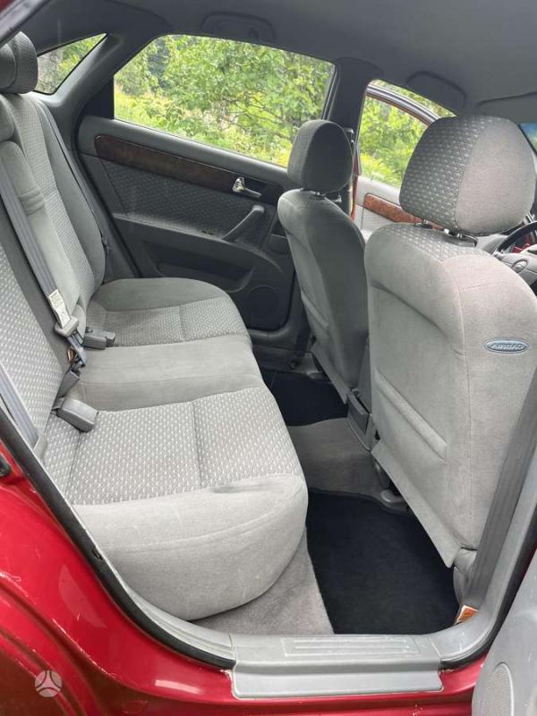 Sarkans Daewoo Nubira 2006 Viļņa, ar dzinēja tilpumu 1.80 L un nobraukumu 182 tūkst. km par 650 €, foto 10 vietnē AUTOMOTO.COM.LV