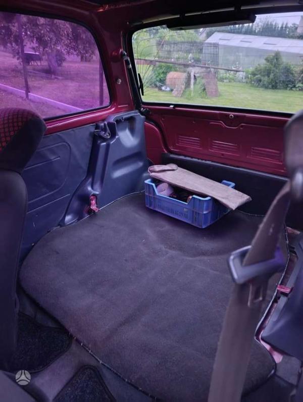 Red Daihatsu Cuore 1996 in Klaipeda, with an engine capacity of 0.85 L and mileage of 200 thousand km for 4500 €, photo 5 on AUTOMOTO.COM.LV