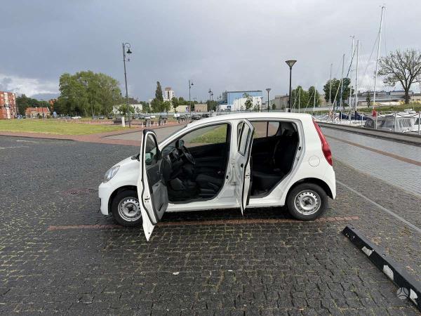 White Daihatsu Cuore 2008 in Klaipeda, with an engine capacity of 1.00 L and mileage of 233 thousand km for 880 €, photo 2 on AUTOMOTO.COM.LV