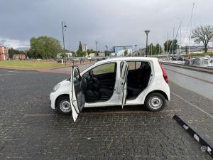 White Daihatsu Cuore 2008 in Klaipeda, with an engine capacity of 1.00 L and mileage of 233 thousand km for 880 €, photo 3 on AUTOMOTO.COM.LV