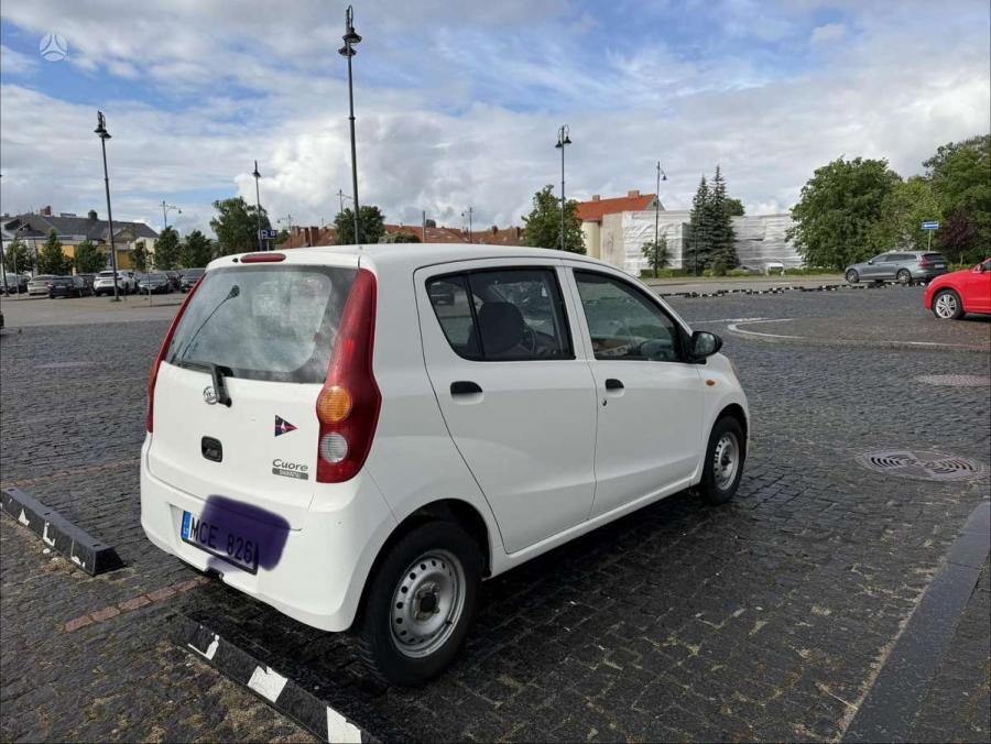 White Daihatsu Cuore 2008 in Klaipeda, with an engine capacity of 1.00 L and mileage of 233 thousand km for 880 €, photo 6 on AUTOMOTO.COM.LV