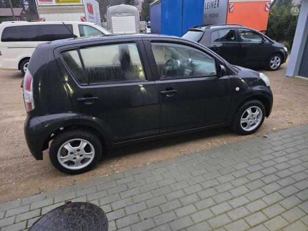 Melns Daihatsu Sirion 2009 Kelmė, ar dzinēja tilpumu 1.30 L un nobraukumu 211 tūkst. km par 1700 €, foto 7 vietnē AUTOMOTO.COM.LV