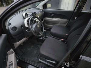 Black Daihatsu Sirion 2009 in Kelme, with an engine capacity of 1.30 L and mileage of 211 thousand km for 1700 €, photo 9 on AUTOMOTO.COM.LV