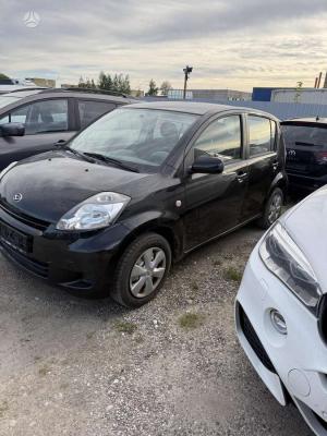 Black Daihatsu Sirion 2011 in Jurbarkas, with an engine capacity of 1.00 L and mileage of 220 thousand km for 1599 €, photo 4 on AUTOMOTO.COM.LV