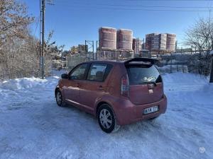 Yellow Daihatsu Sirion 2005 in Vilnius, with an engine capacity of 1.00 L and mileage of 225 thousand km for 590 €, photo 3 on AUTOMOTO.COM.LV