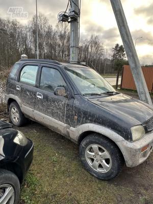 Melns Daihatsu Terios 1997 Viļņa, ar dzinēja tilpumu 1.30 L un nobraukumu 210 tūkst. km par 600 €, foto  vietnē AUTOMOTO.COM.LV