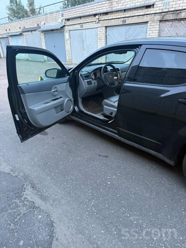 Black Dodge Avenger 2008 in Riga, with an engine capacity of 2.70 L and mileage of 230 thousand km for 700 €, photo 5 on AUTOMOTO.COM.LV