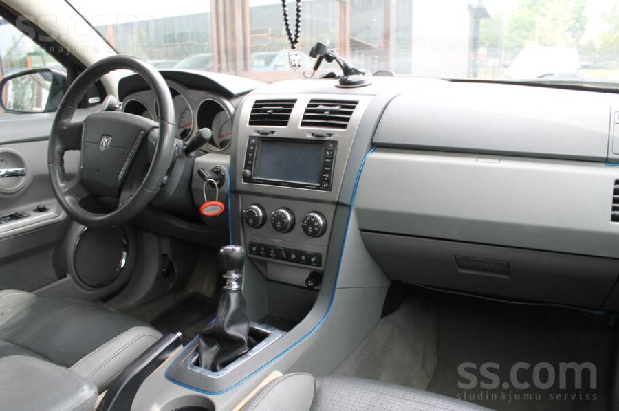 Orange Dodge Avenger 2007 in Riga, with an engine capacity of 2.00 L and mileage of 0 thousand km for 2490 €, photo 12 on AUTOMOTO.COM.LV