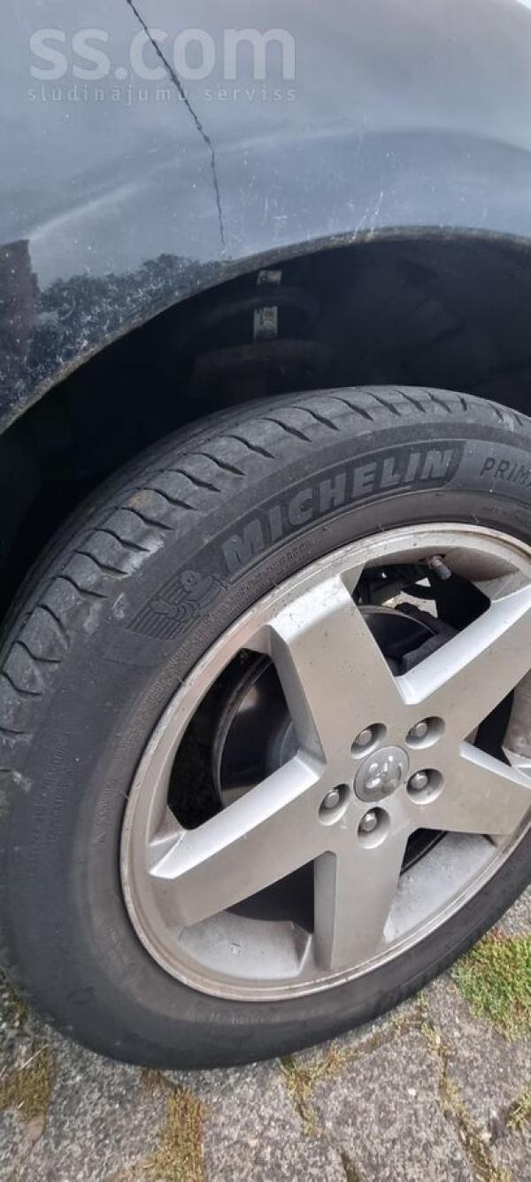Black Dodge Caliber 2008 in Riga, with an engine capacity of 1.80 L and mileage of 176 thousand km for 2300 €, photo 11 on AUTOMOTO.COM.LV