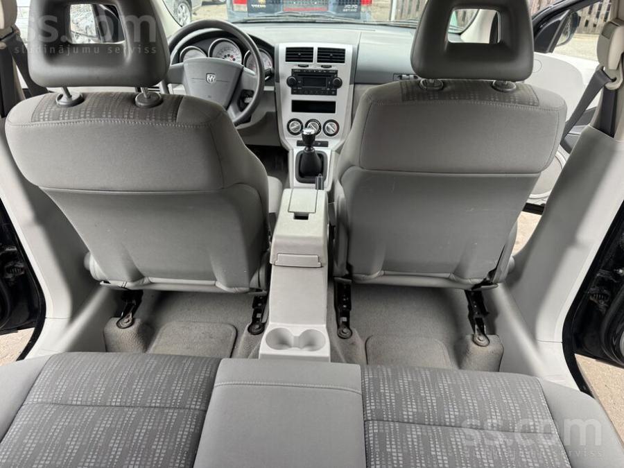 Black Dodge Caliber 2006 in Riga, with an engine capacity of 2.00 L and mileage of 200 thousand km for 2250 €, photo 12 on AUTOMOTO.COM.LV