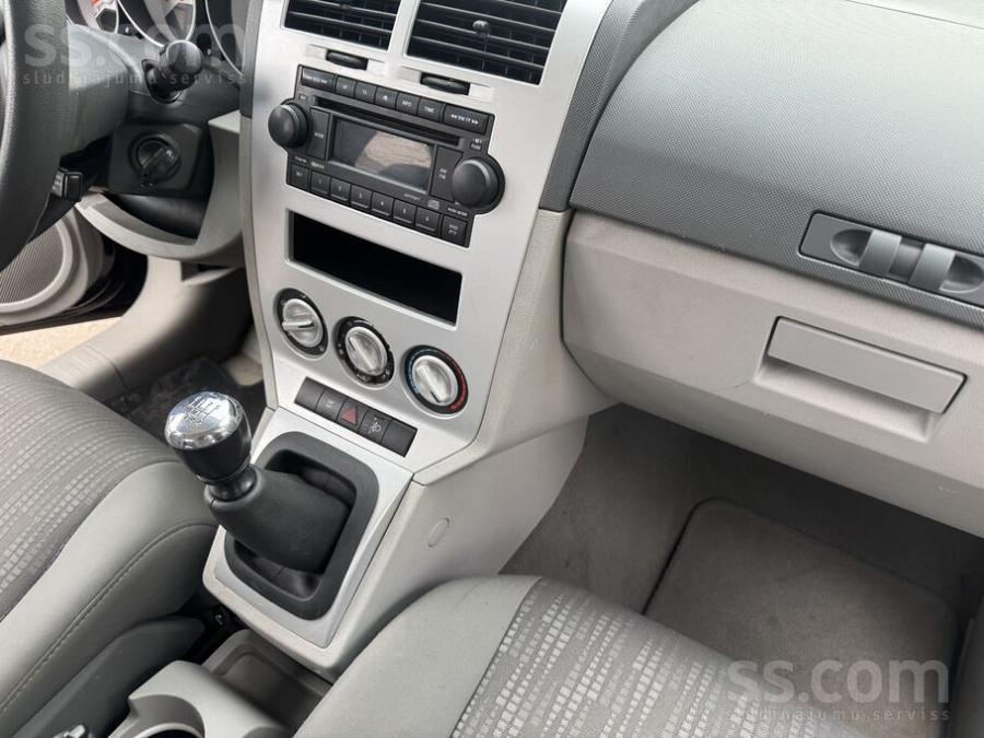 Black Dodge Caliber 2006 in Riga, with an engine capacity of 2.00 L and mileage of 200 thousand km for 2250 €, photo 14 on AUTOMOTO.COM.LV