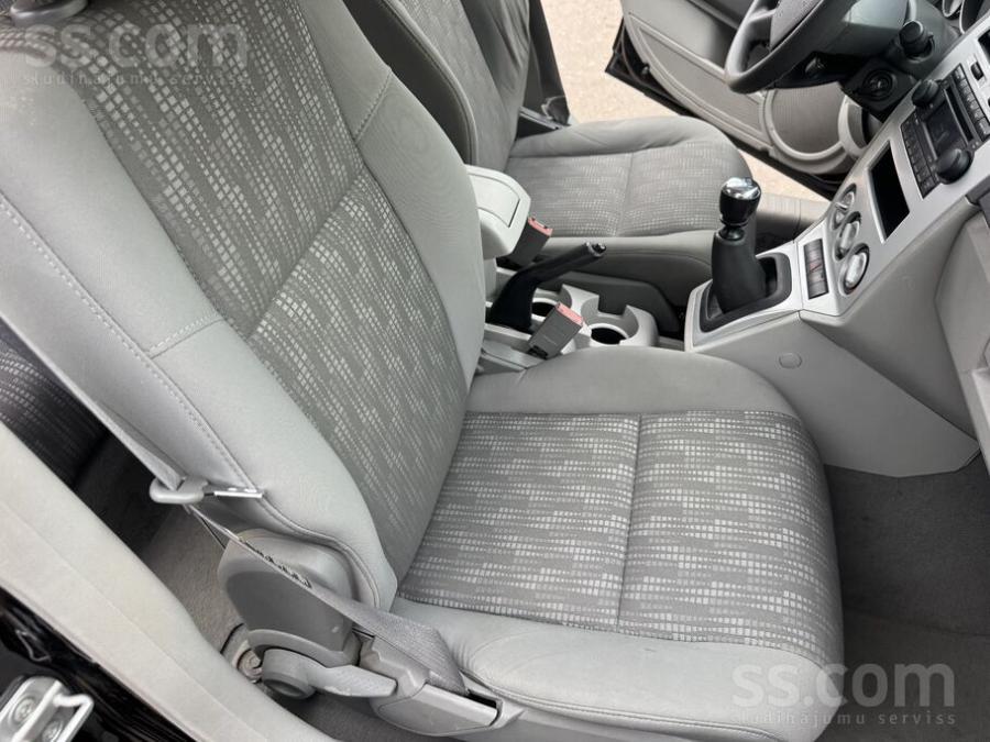 Black Dodge Caliber 2006 in Riga, with an engine capacity of 2.00 L and mileage of 200 thousand km for 2250 €, photo 15 on AUTOMOTO.COM.LV