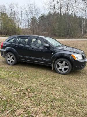 Black Dodge Caliber 2008 in Vilnius, with an engine capacity of 2.00 L and mileage of 217 thousand km for 2200 €, photo 11 on AUTOMOTO.COM.LV