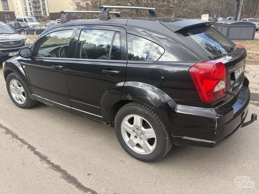 Black Dodge Caliber 2009 in Vilnius, with an engine capacity of 2.00 L and mileage of 191 thousand km for 950 €, photo 6 on AUTOMOTO.COM.LV