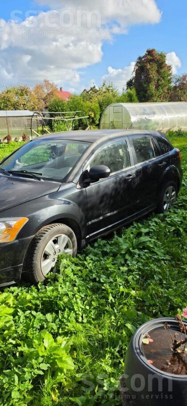 Black Dodge Caliber 2009 in Valmiera, with an engine capacity of 1.80 L and mileage of 210 thousand km for 700 €, photo 4 on AUTOMOTO.COM.LV