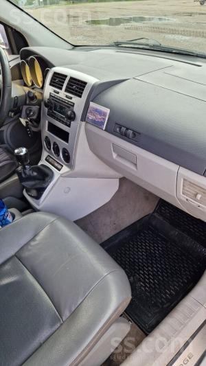 Pelēks Dodge Caliber 2007 Rīga, ar dzinēja tilpumu 2.00 L un nobraukumu 229 tūkst. km par 1940 €, foto 18 vietnē AUTOMOTO.COM.LV