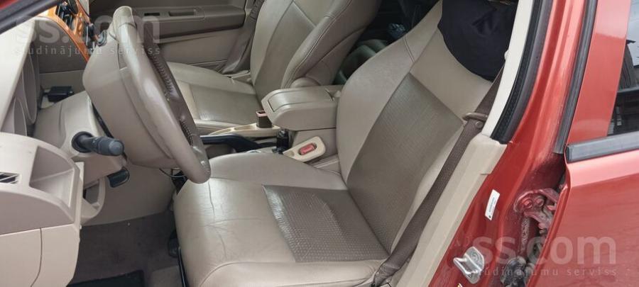 Oranžs Dodge Caliber 2006 Rīga, ar dzinēja tilpumu 2.00 L un nobraukumu 225 tūkst. km par 600 €, foto 6 vietnē AUTOMOTO.COM.LV