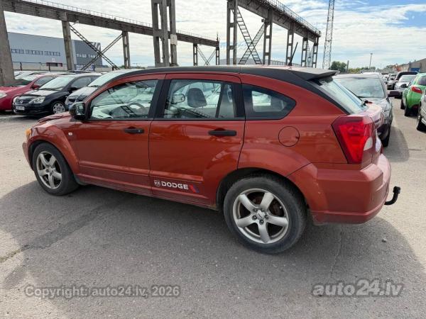 Red Dodge Caliber 2007 in Tallinn, with an engine capacity of 2.00 L and mileage of 299 thousand km for 799 €, photo 4 on AUTOMOTO.COM.LV