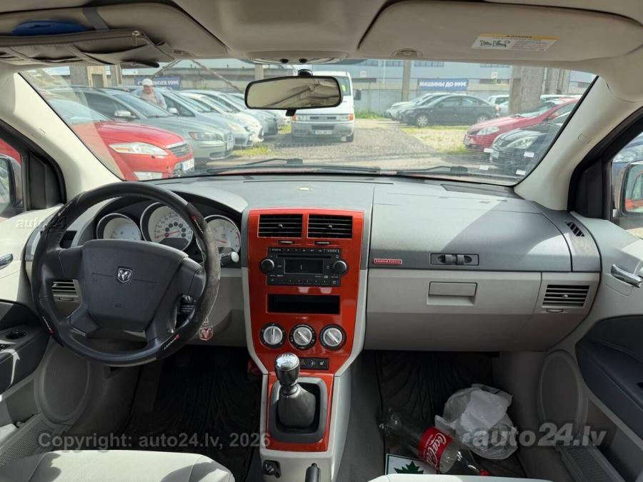Red Dodge Caliber 2007 in Tallinn, with an engine capacity of 2.00 L and mileage of 299 thousand km for 799 €, photo 6 on AUTOMOTO.COM.LV