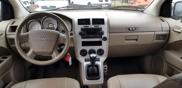 Red Dodge Caliber 2007 in Valmiera, with an engine capacity of 1.80 L and mileage of 277 thousand km for 2250 €, photo 9 on AUTOMOTO.COM.LV