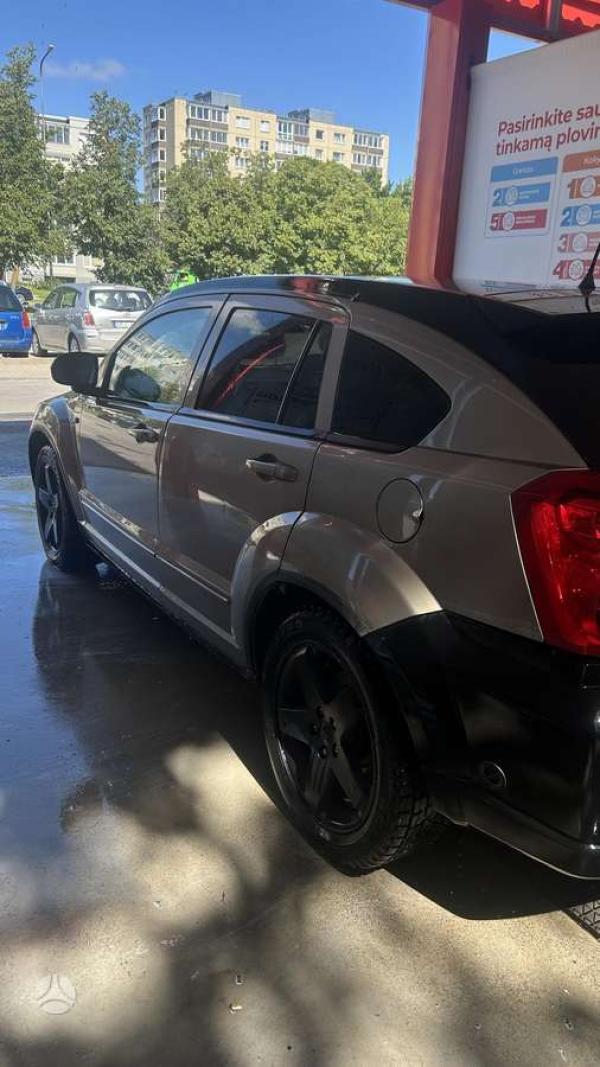 Yellow Dodge Caliber 2007 in Siauliai, with an engine capacity of 2.00 L and mileage of 253 thousand km for 1200 €, photo 1 on AUTOMOTO.COM.LV