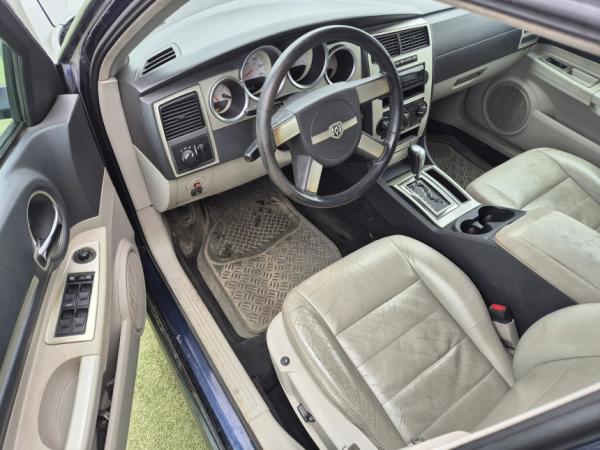 Green Dodge Caravan 2004 in Riga, with an engine capacity of 3.50 L and mileage of 159 thousand km for 2300 €, photo 8 on AUTOMOTO.COM.LV