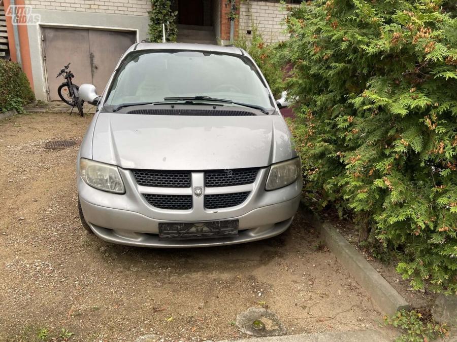 Grey Dodge Caravan 2003 in Kaunas, with an engine capacity of 3.30 L and mileage of 289 thousand km for 450 €, photo 1 on AUTOMOTO.COM.LV