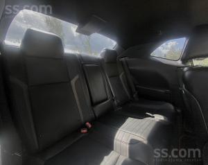 Black Dodge Challenger 2010 in Talsi, with an engine capacity of 3.50 L and mileage of 178 thousand km for 13500 €, photo 12 on AUTOMOTO.COM.LV