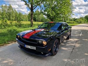 Black Dodge Challenger 2013 in Talsi, with an engine capacity of 3.60 L and mileage of 110 thousand km for 12500 €, photo  on AUTOMOTO.COM.LV