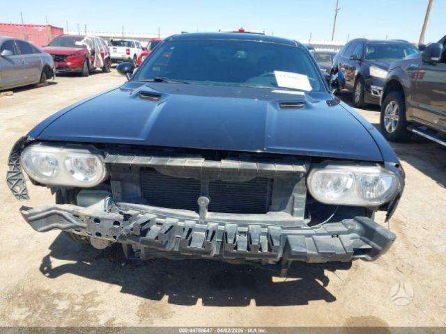 Black Dodge Challenger 2013 in Klaipeda, with an engine capacity of 3.60 L and mileage of 207 thousand km for 4500 €, photo 14 on AUTOMOTO.COM.LV