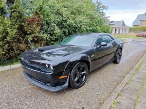 Black Dodge Challenger 2013 in Vilnius, with an engine capacity of 5.70 L and mileage of 91 thousand km for 17600 €, photo  on AUTOMOTO.COM.LV