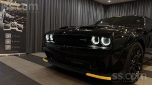 Black Dodge Challenger 2018 in Riga, with an engine capacity of 3.60 L and mileage of 130 thousand km for 18990 €, photo 18 on AUTOMOTO.COM.LV
