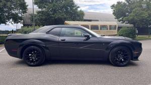 Black Dodge Challenger 2018 in Kaunas, with an engine capacity of 3.60 L and mileage of 169 thousand km for 18650 €, photo 4 on AUTOMOTO.COM.LV