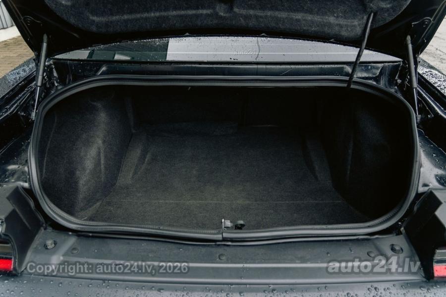 Black Dodge Challenger 2018 in Tallinn, with an engine capacity of 3.60 L and mileage of 206 thousand km for 20500 €, photo 26 on AUTOMOTO.COM.LV
