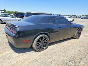 Black Dodge Challenger 2018 in Klaipeda, with an engine capacity of 3.60 L and mileage of 193 thousand km for 9850 €, photo 5 on AUTOMOTO.COM.LV