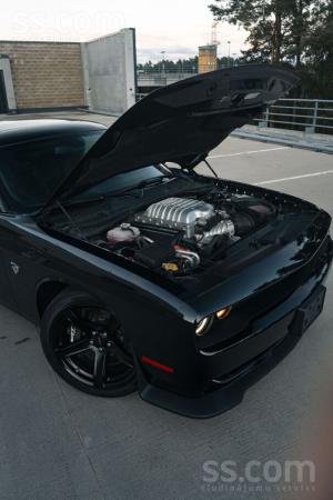 Black Dodge Challenger 2021 in Ogre, with an engine capacity of 6.20 L and mileage of 39 thousand km for 79000 €, photo 13 on AUTOMOTO.COM.LV