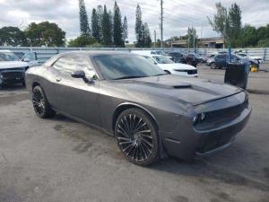 Brūns Dodge Challenger 2017 Šauļi, ar dzinēja tilpumu 3.60 L un nobraukumu 145 tūkst. km par 9650 €, foto  vietnē AUTOMOTO.COM.LV