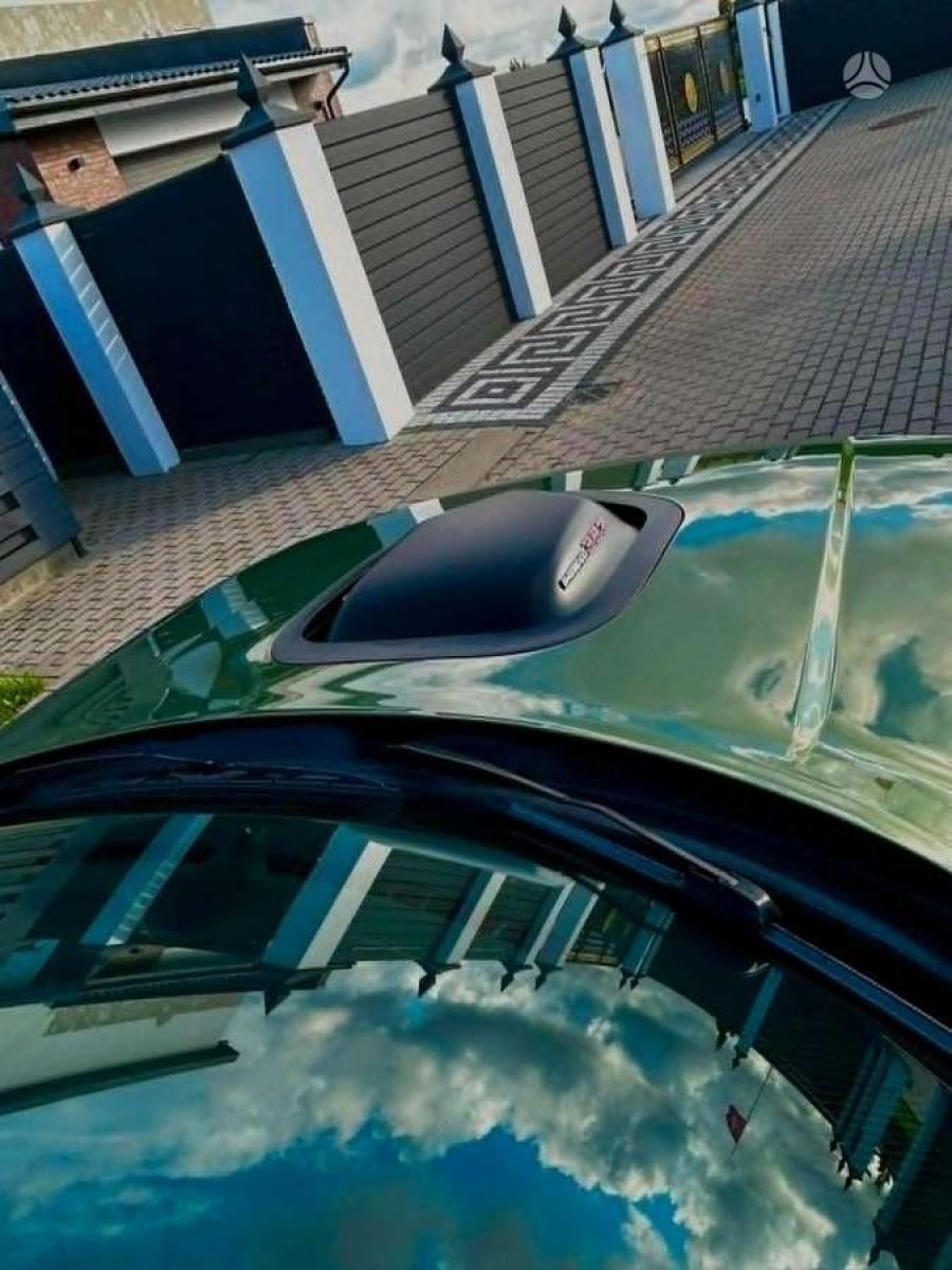 Green Dodge Challenger 2018 in Klaipeda, with an engine capacity of 6.42 L and mileage of 45 thousand km for 27000 €, photo 13 on AUTOMOTO.COM.LV