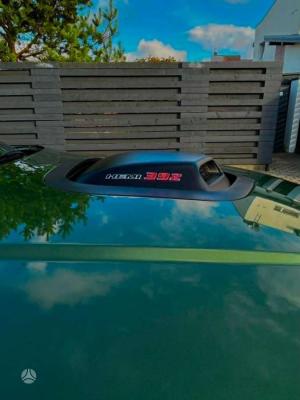 Green Dodge Challenger 2018 in Klaipeda, with an engine capacity of 6.42 L and mileage of 45 thousand km for 27000 €, photo 14 on AUTOMOTO.COM.LV