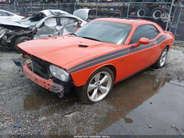 Orange Dodge Challenger 2013 in Klaipeda, with an engine capacity of 5.70 L and mileage of 111 thousand km for 4000 €, photo 2 on AUTOMOTO.COM.LV