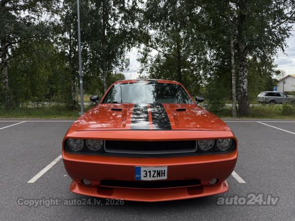 Додж Челенджер 2013 в Таллин на AUTOMOTO.COM.LV Оранжевый Додж Челенджер 2013 в Таллин, объемом двигателя 3.60 л и пробегом 135 тыс. км за 13999 €, фото 4 на AUTOMOTO.COM.LV