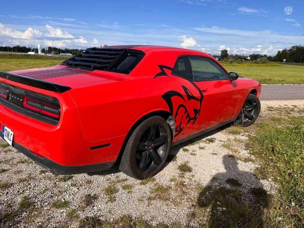 Oranžs Dodge Challenger 2017 Narva, ar dzinēja tilpumu 5.70 L un nobraukumu 74 tūkst. km par 22500 €, foto 2 vietnē AUTOMOTO.COM.LV