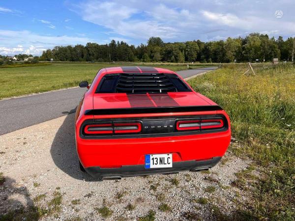 Oranžs Dodge Challenger 2017 Narva, ar dzinēja tilpumu 5.70 L un nobraukumu 74 tūkst. km par 22500 €, foto 4 vietnē AUTOMOTO.COM.LV